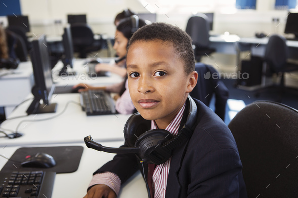 Students using computer in classroom Stock Photo by Image-Source ...