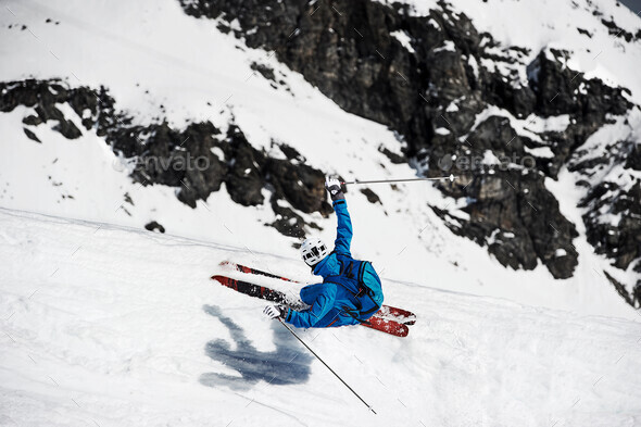 Overhead view of man skiing at speed down mountain Stock Photo by Image ...