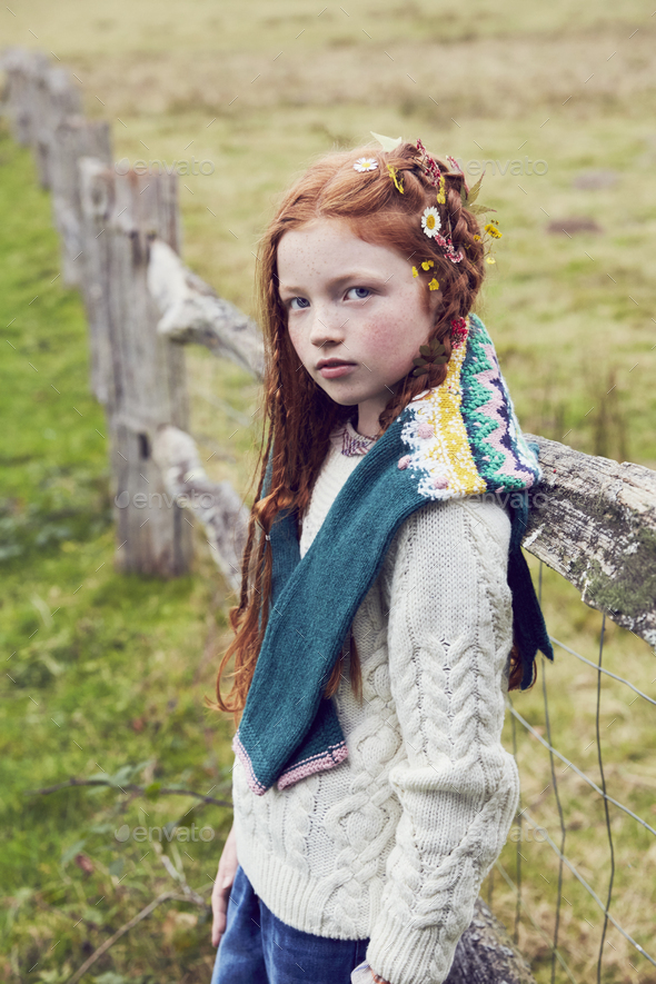 Portrait of young girl in rural setting Stock Photo by Image-Source
