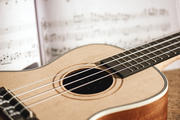 Ukulele chords. Close-up photo of ukulele guitar and music notes ...