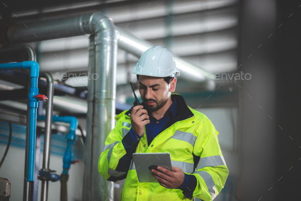 professional technician engineer working to control electrical power ...