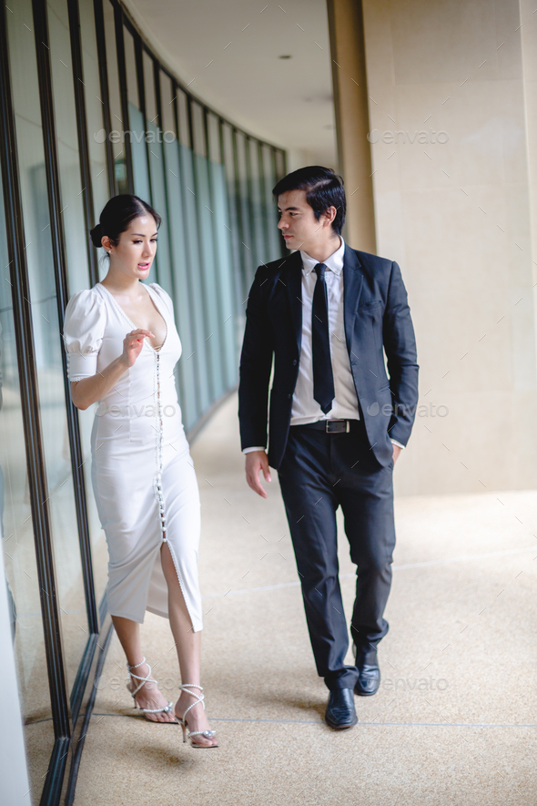 professional business partner person talking together, man and woman ...