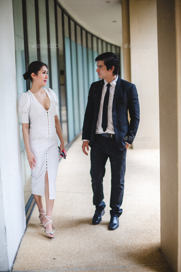 professional business partner person talking together, man and woman ...