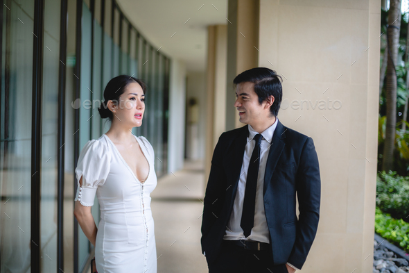 professional business partner person talking together, man and woman ...