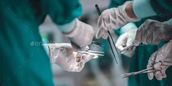 surgeon doctor team working in operation room at hospital, medical ...