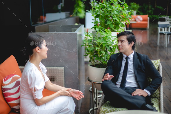 professional business partner person talking together, man and woman ...