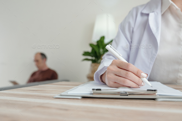 Doctor Writing Out Prescription Stock Photo by DragonImages | PhotoDune