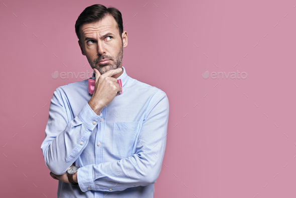 Thinking man at the pink background Stock Photo by gpointstudio | PhotoDune