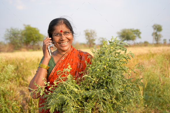 Rural Indian women in the field, Maharashtra, India. Stock Photo by ...