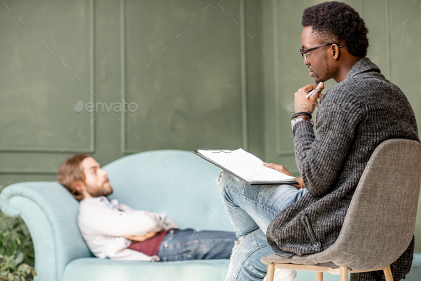 Man during a psychological session with psychologist Stock Photo by ...