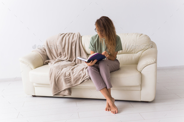 Beautiful girl read book. Concept of relaxation, slow life, hobby, home ...