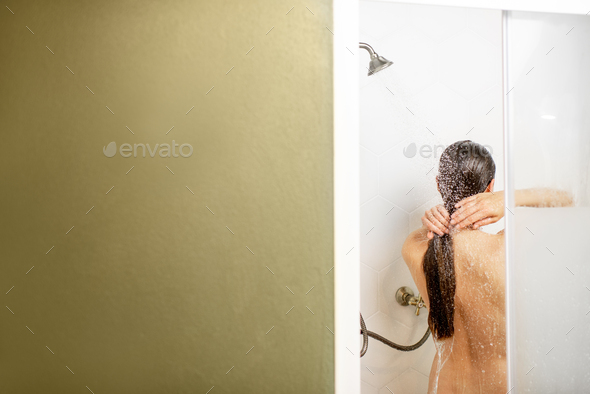Woman washing hair in the shower Stock Photo by RossHelen | PhotoDune