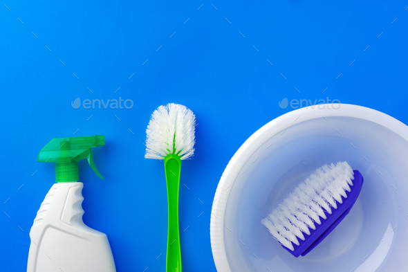 House cleaning supplies on blue color background Stock Photo by ...