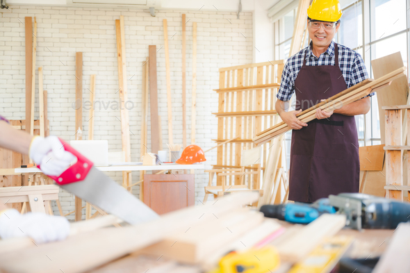 wooden workshop concept, carpenter team craftsman person working with a ...