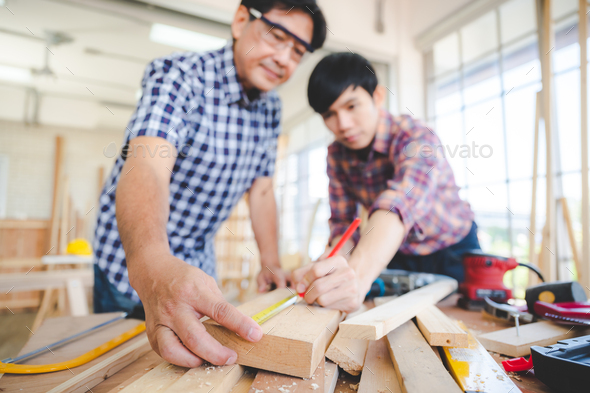 wooden workshop concept, carpenter team craftsman person working with a ...