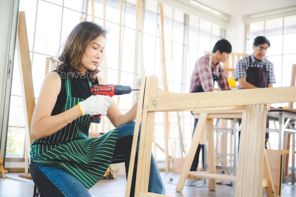 wooden workshop concept, carpenter team craftsman person working with a ...