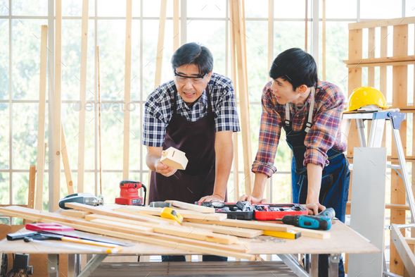 wooden workshop concept, carpenter team craftsman person working with a ...