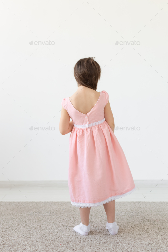Fashion designer, kids and child concept - back view of little girl ...