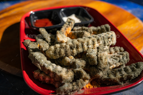 moldy french fries closeup, fungal moldy on unhealthy old food on plate ...