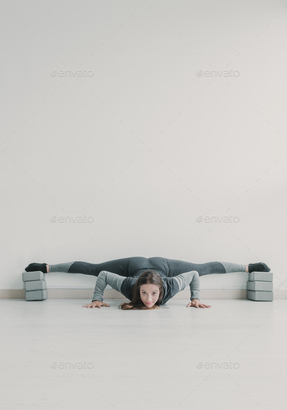 Flexible lady stretching in studio Stock Photo by ADDICTIVE_STOCK ...