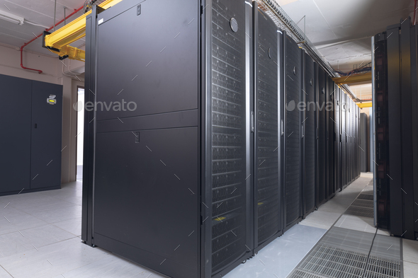 Data center with multiple rows of fully operational server racks Stock ...