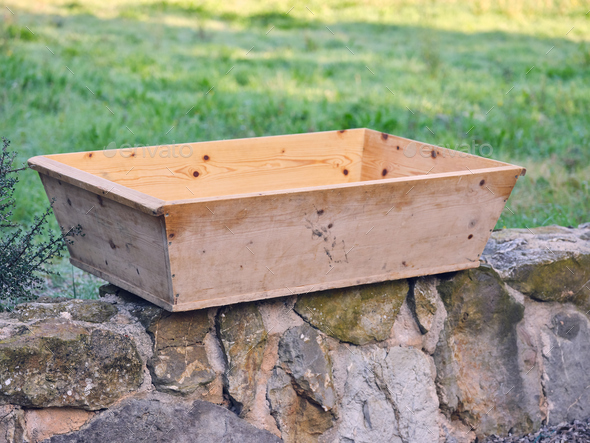 Empty trough on stone fence Stock Photo by ADDICTIVE_STOCK | PhotoDune