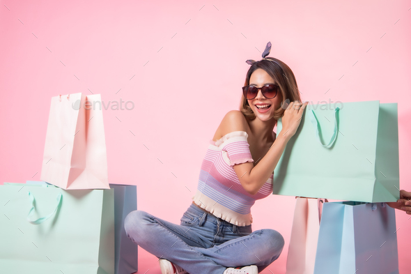 WOMAN SHOPPING PINK BACKGROUND Stock Photo by anontae2522 | PhotoDune