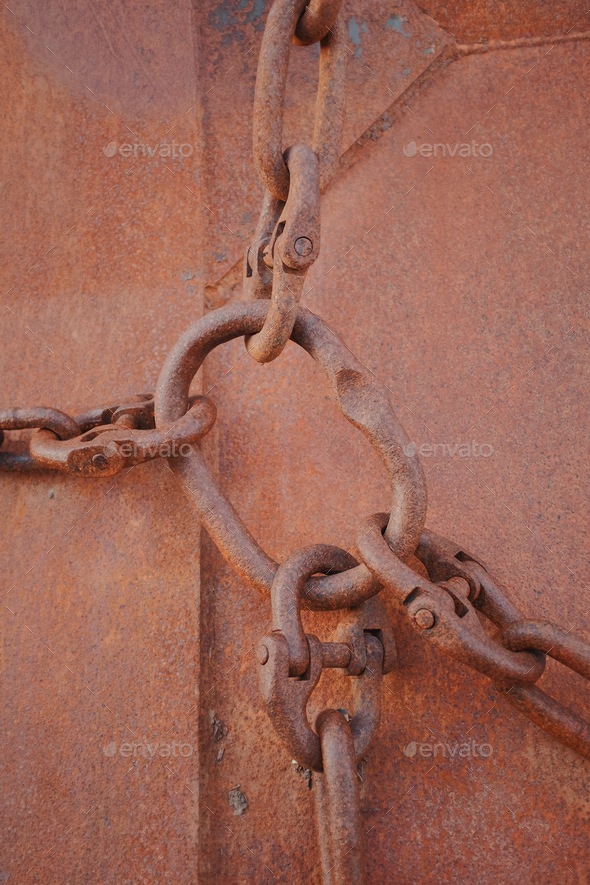detail of a rusty old chain link on a metal background Stock Photo by ...