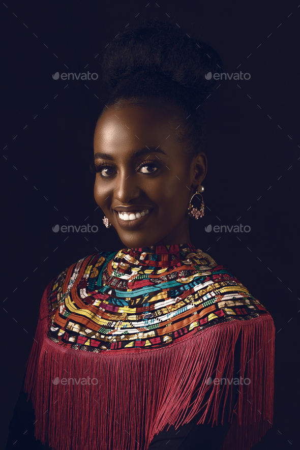 Portraits of kenyan lady in traditional outfit Stock Photo by scopioimages