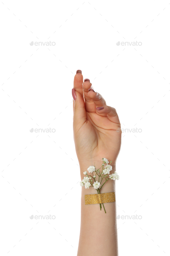 Beautiful female hand with flowers isolated on white background Stock ...