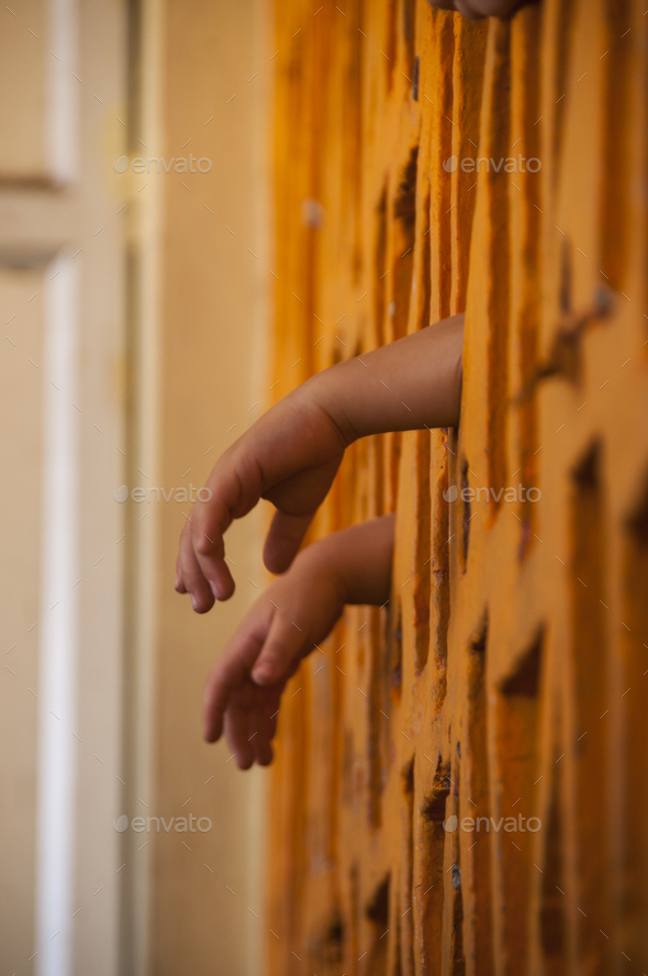 Hands rising out from small window Stock Photo by crshelare | PhotoDune