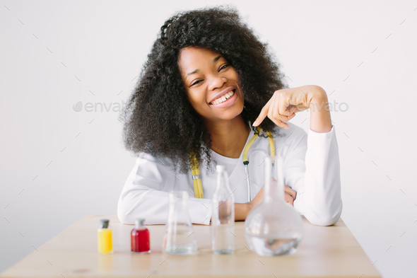 African American girl researcher student carrying out research in a ...
