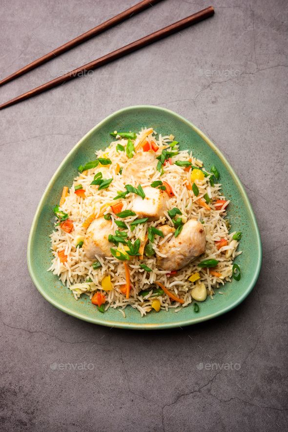 schezwan chicken fried rice Stock Photo by stockimagefactory | PhotoDune
