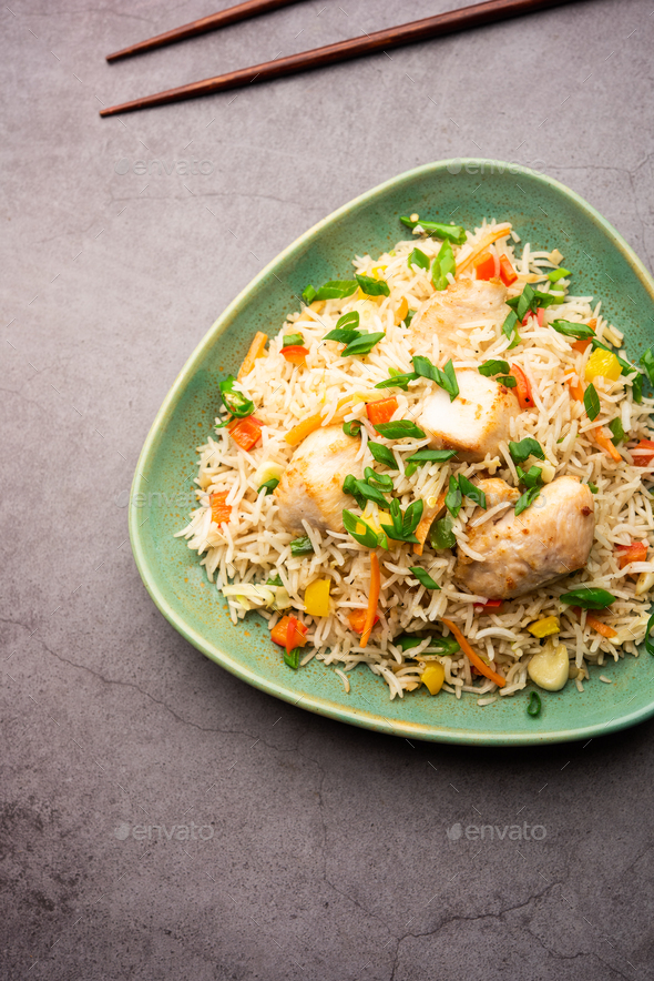 schezwan chicken fried rice Stock Photo by stockimagefactory | PhotoDune