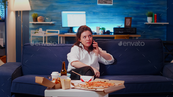 Young person eating chinese food answering phone call Stock Photo by DC ...