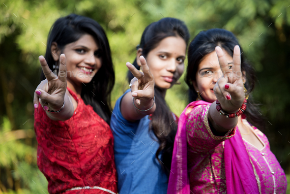 Happy Indian young girls smiling and having fun at outdoor. Stock Photo ...