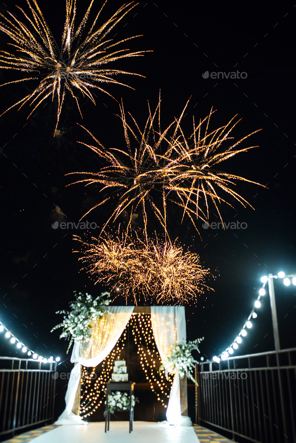 coloder wedding cake at the wedding of the newlyweds Stock Photo by ...