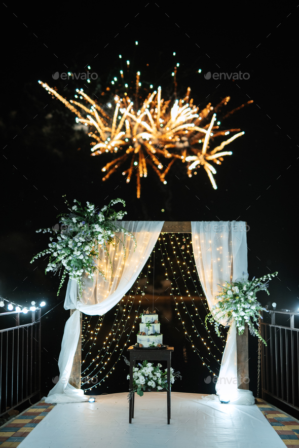 coloder wedding cake at the wedding of the newlyweds Stock Photo by ...