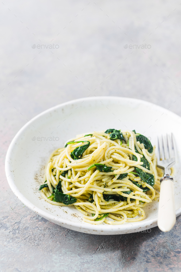 Spaghetti pasta with spinach Stock Photo by ipolly80 | PhotoDune