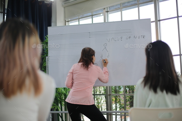 student learning a music song of classic musical class at home studio ...