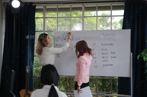 student learning a music song of classic musical class at home studio ...