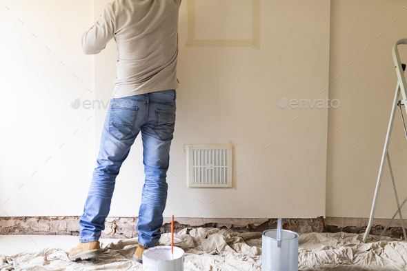 Man renovating his home for interior remodeling Stock Photo by Rawpixel