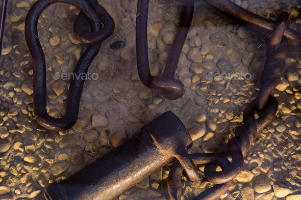 Ancient fetters or legcuffs on the ground close-up Stock Photo by Yakov ...