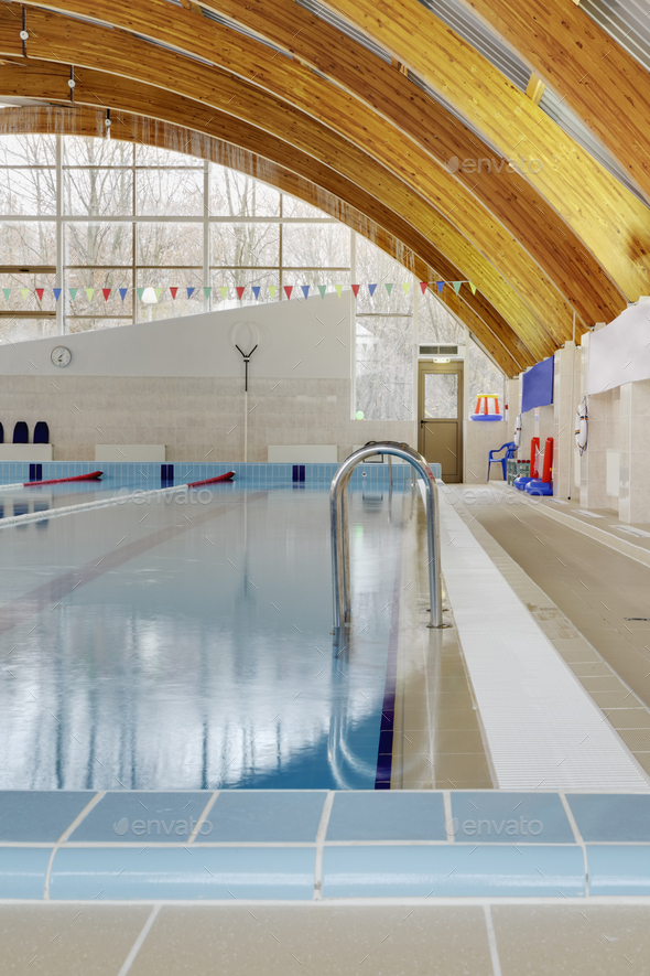 Roof beams under a curved roof over an indoor swimming pool. Stock ...