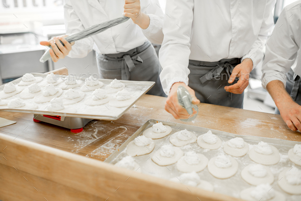 Forming buns at the manufacturing Stock Photo by RossHelen | PhotoDune
