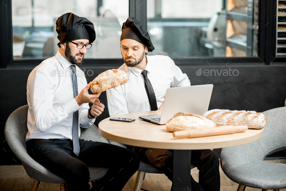 Bakers working with bread in the office Stock Photo by RossHelen ...