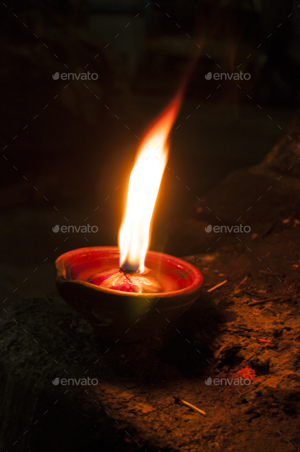 Firing diya in temple for prayer worship Stock Photo by crshelare ...