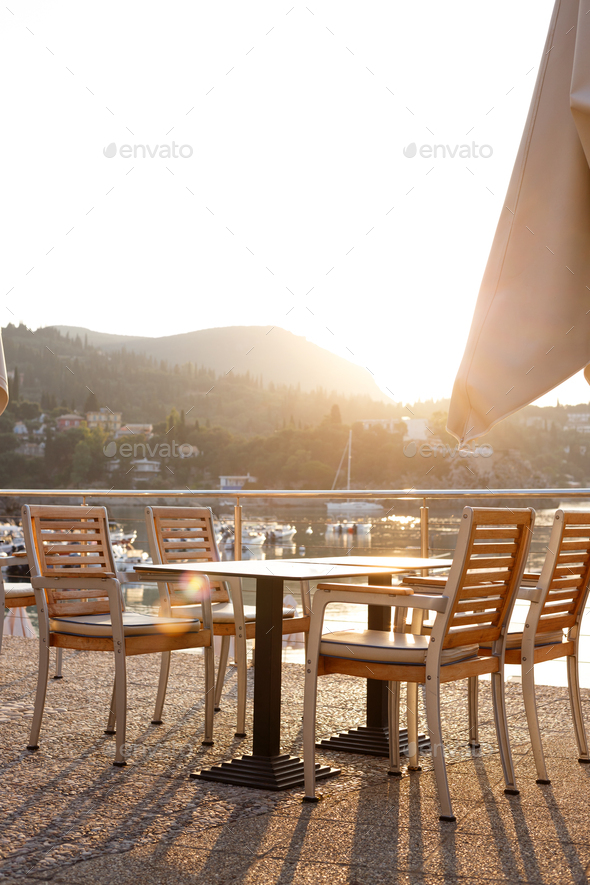 cafe on the waterfront Stock Photo by azgek | PhotoDune
