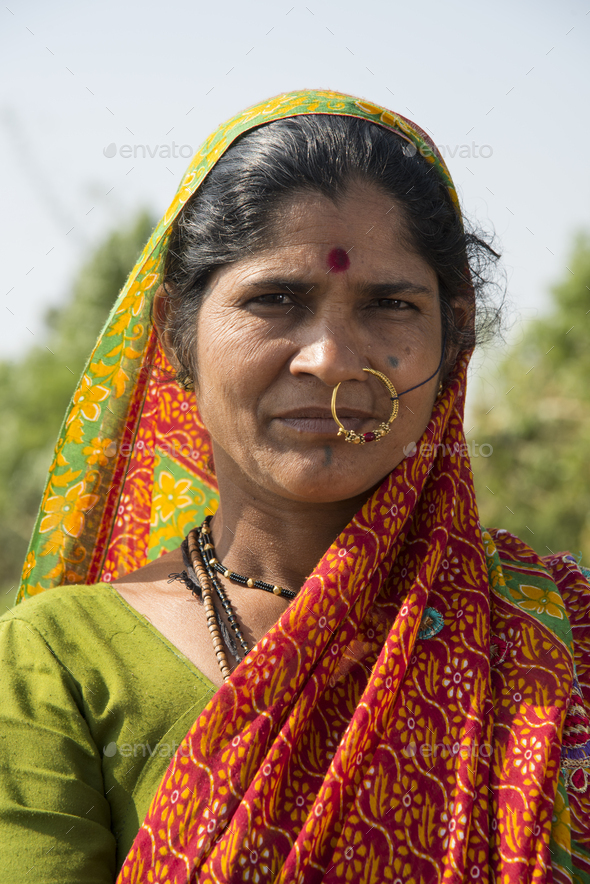 Portrait of rural women in traditional clothes. Stock Photo by crshelare