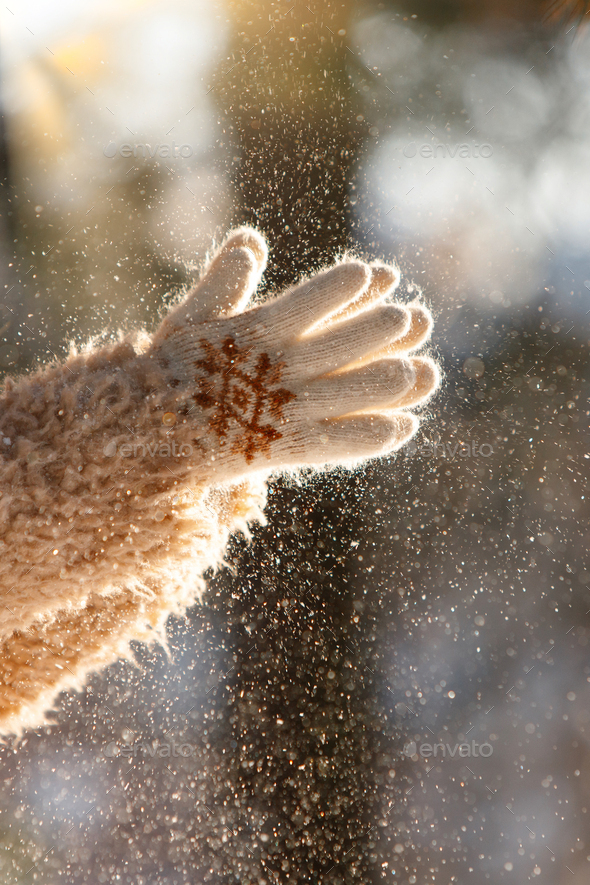 female hands in gloves clap and shake hands out of snow Stock Photo by ...